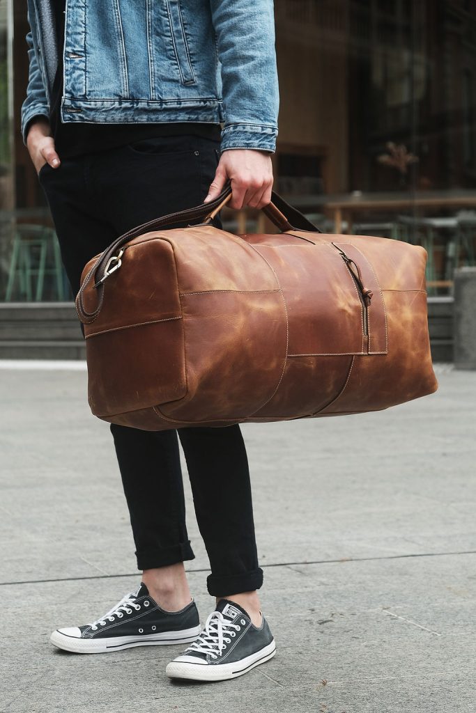 One-Of-A-Kind Leather Duffle Bag With Contemporary Suave Aesthetics